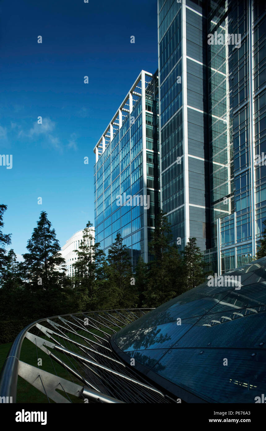 View of office buildings in London's Docklands reflected in DLR tube ...