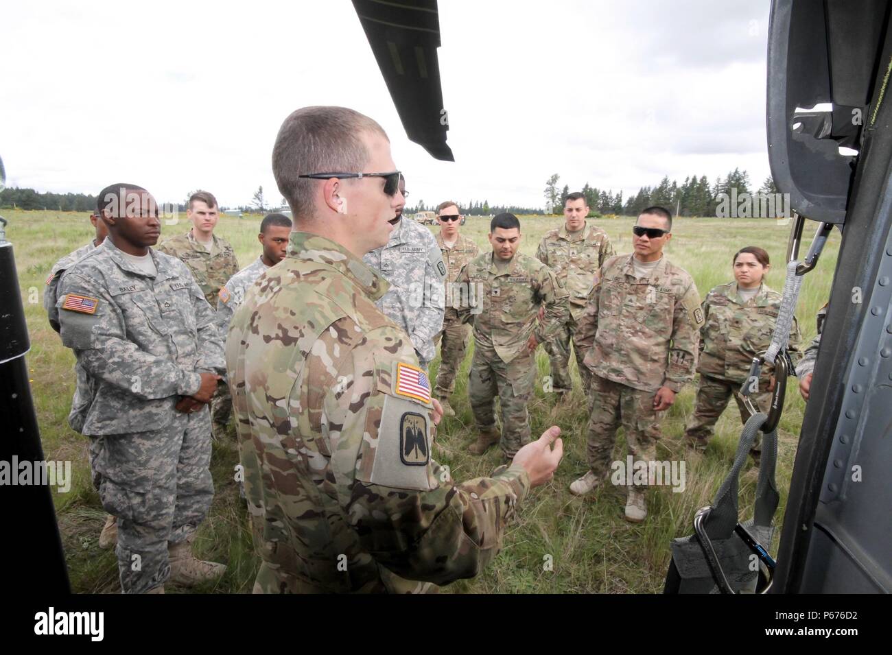 A U.S. Army crew chief assigned to 16th Combat Aviation Brigade briefs ...