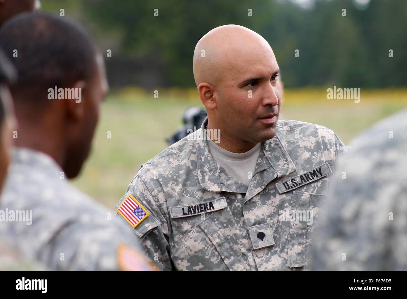 A U.S. Army crew chief assigned to 16th Combat Aviation Brigade briefs ...