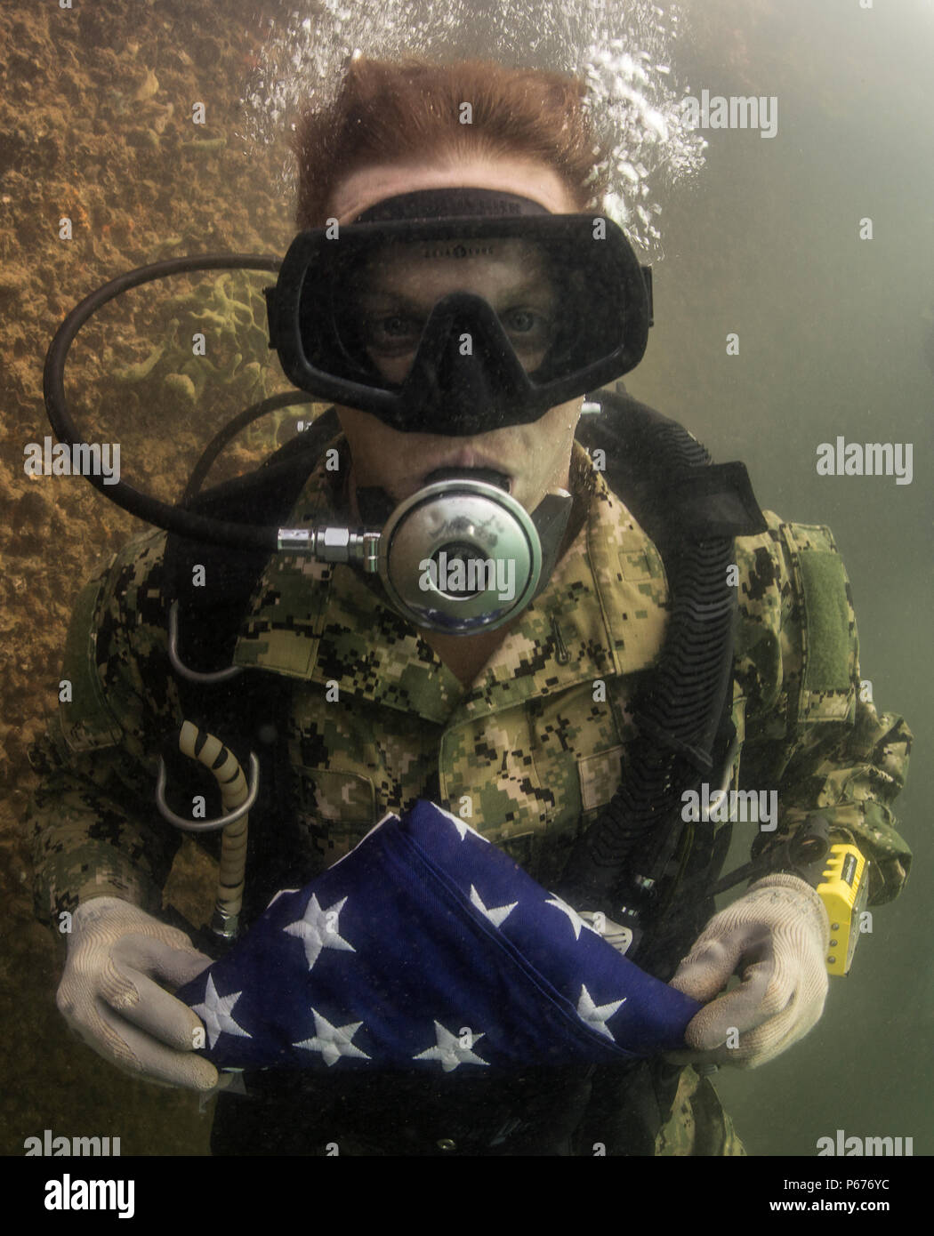 Builder 2nd Class Justin Lieder, with Underwater Construction Team (UCT ...
