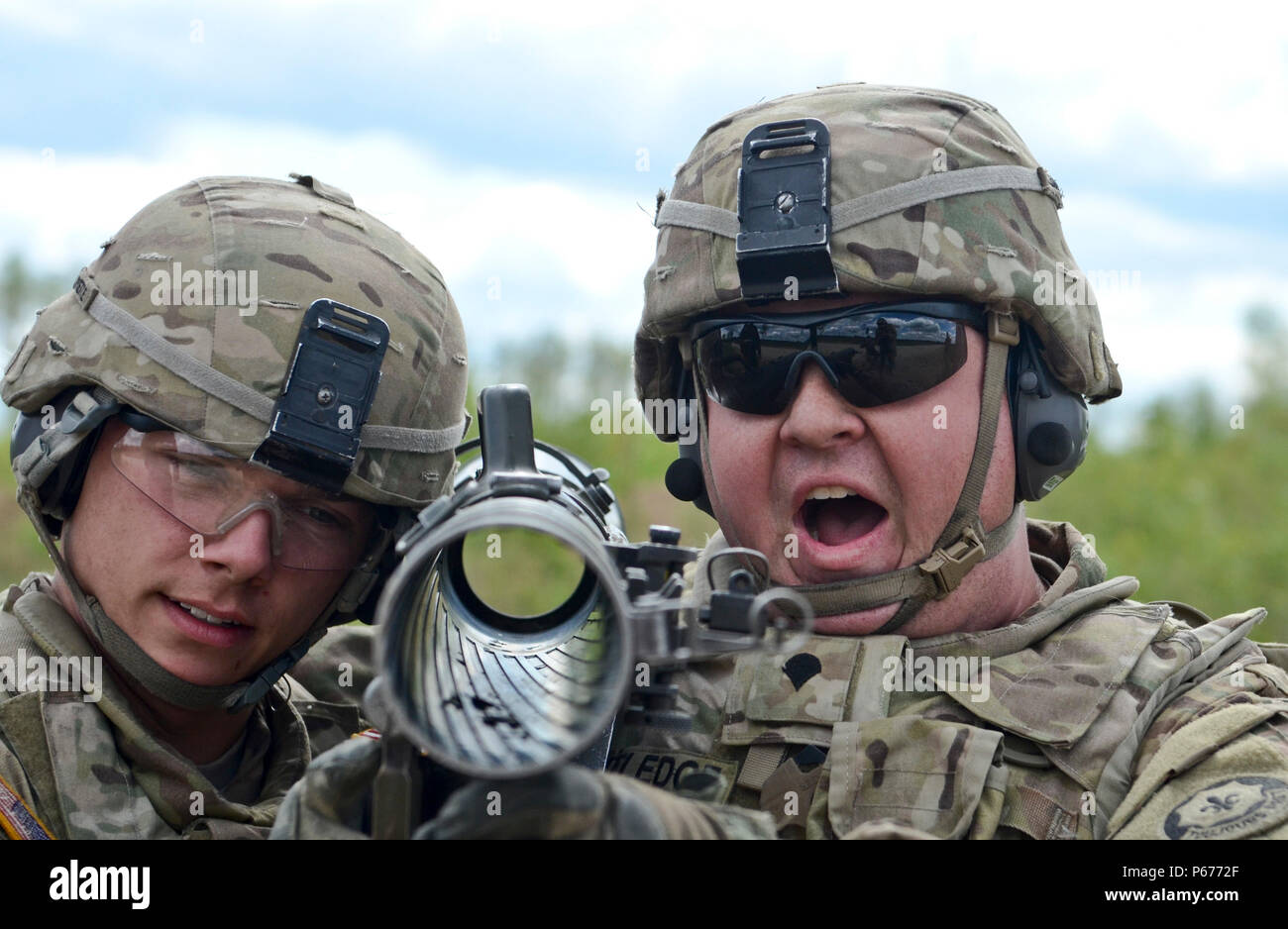U.S. Army Soldiers Spc. Joshua Rutledge (right) and Pfc. Austin Piette ...