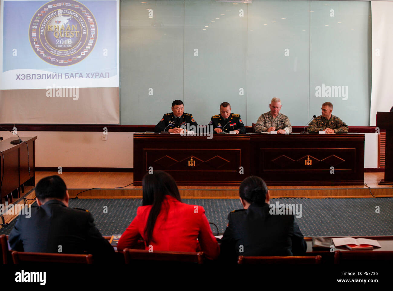 Mongolian Armed Forces Col. L.Ganselem, left, Mongolian Armed Forces ...