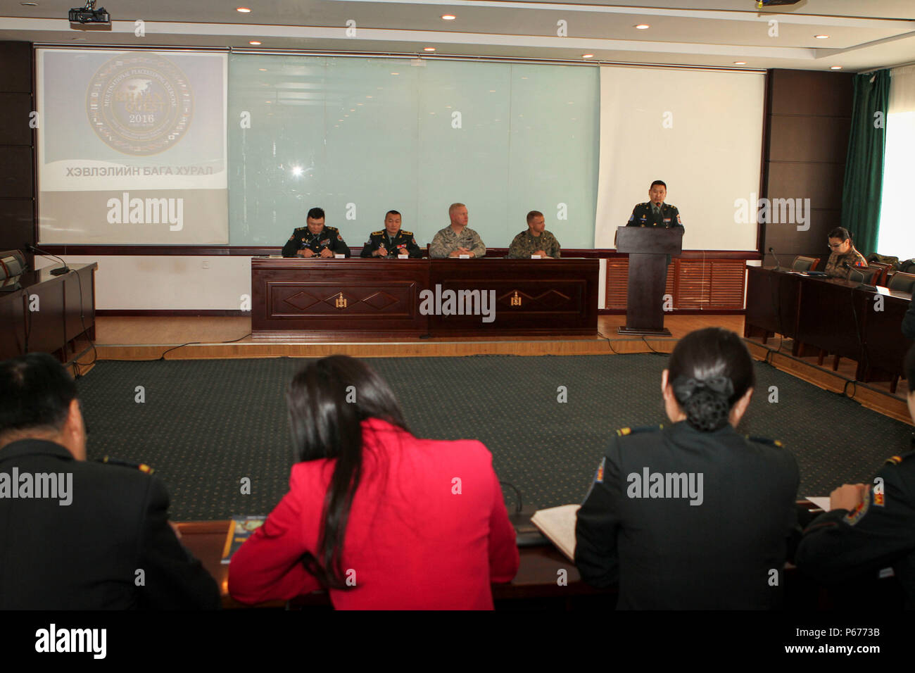 Mongolian Armed Forces Col. L.Ganselem, left, Mongolian Armed Forces ...