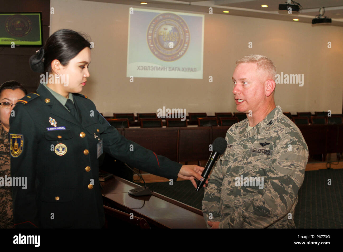 A Mongolian Armed Forces soldier interviews U.S. Air Force Col. Carl ...