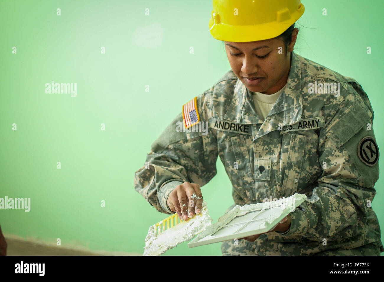 U.S. Army Spc. Loretta Andrike, assigned to 411th Engineer Battalion ...