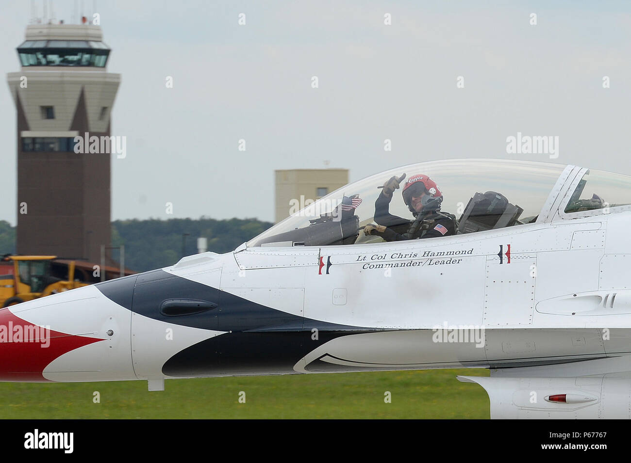 Lt. Col. Christopher Hammond, Thunderbird 1, waves to the crowd before ...