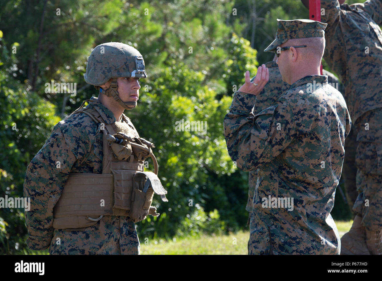 U.S. Marine Corps Gunnery Sgt. Don E. Turner, Jr., right, the Alpha ...