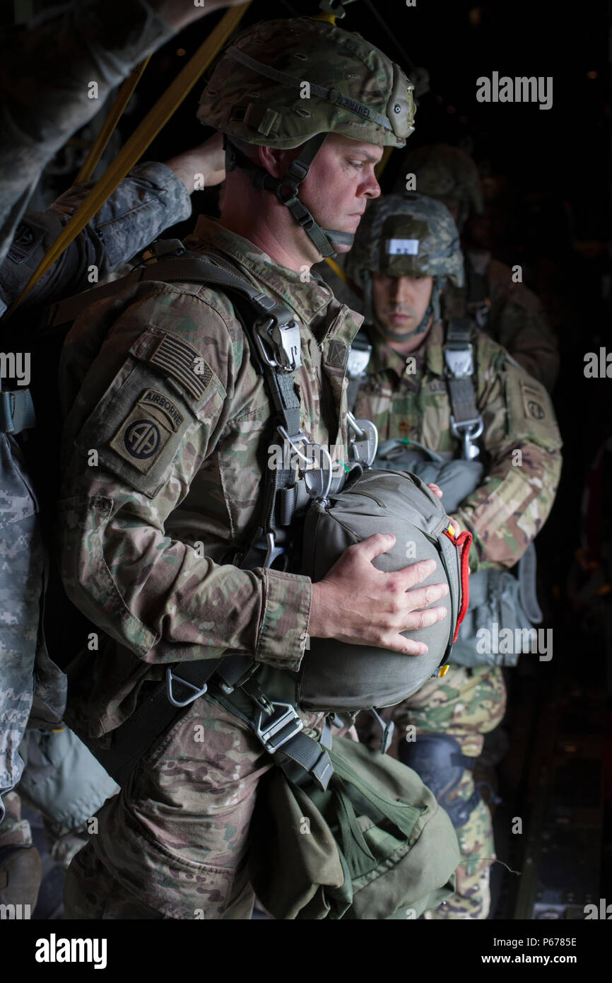 U.S. Army Maj. Eric Schnabel prepares to exit a C-130 Hercules during a ...