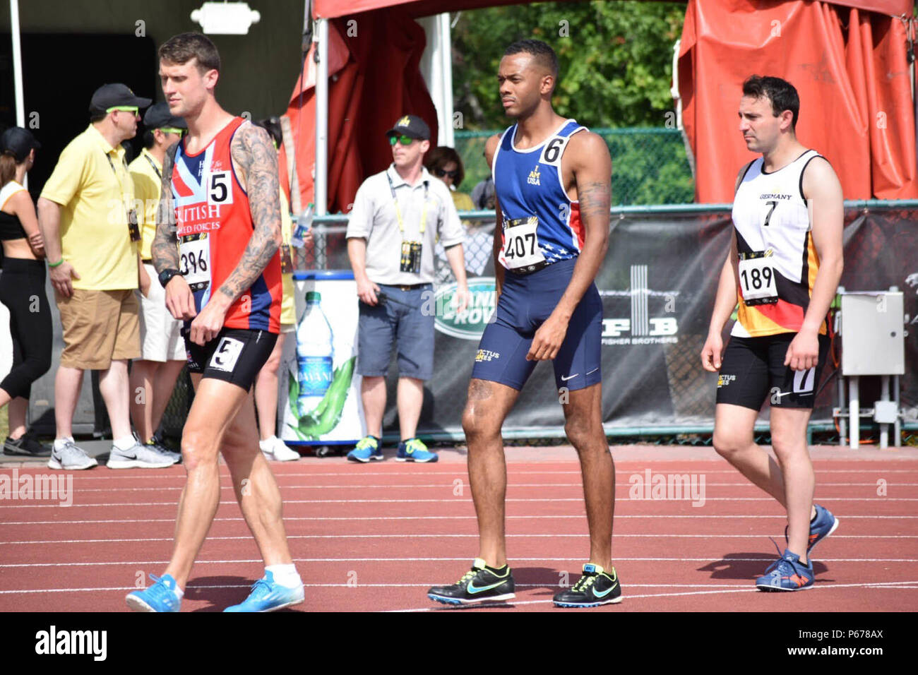 Navy Hospital Corpsman 2nd Class Angelo Anderson (middle) prepares to ...