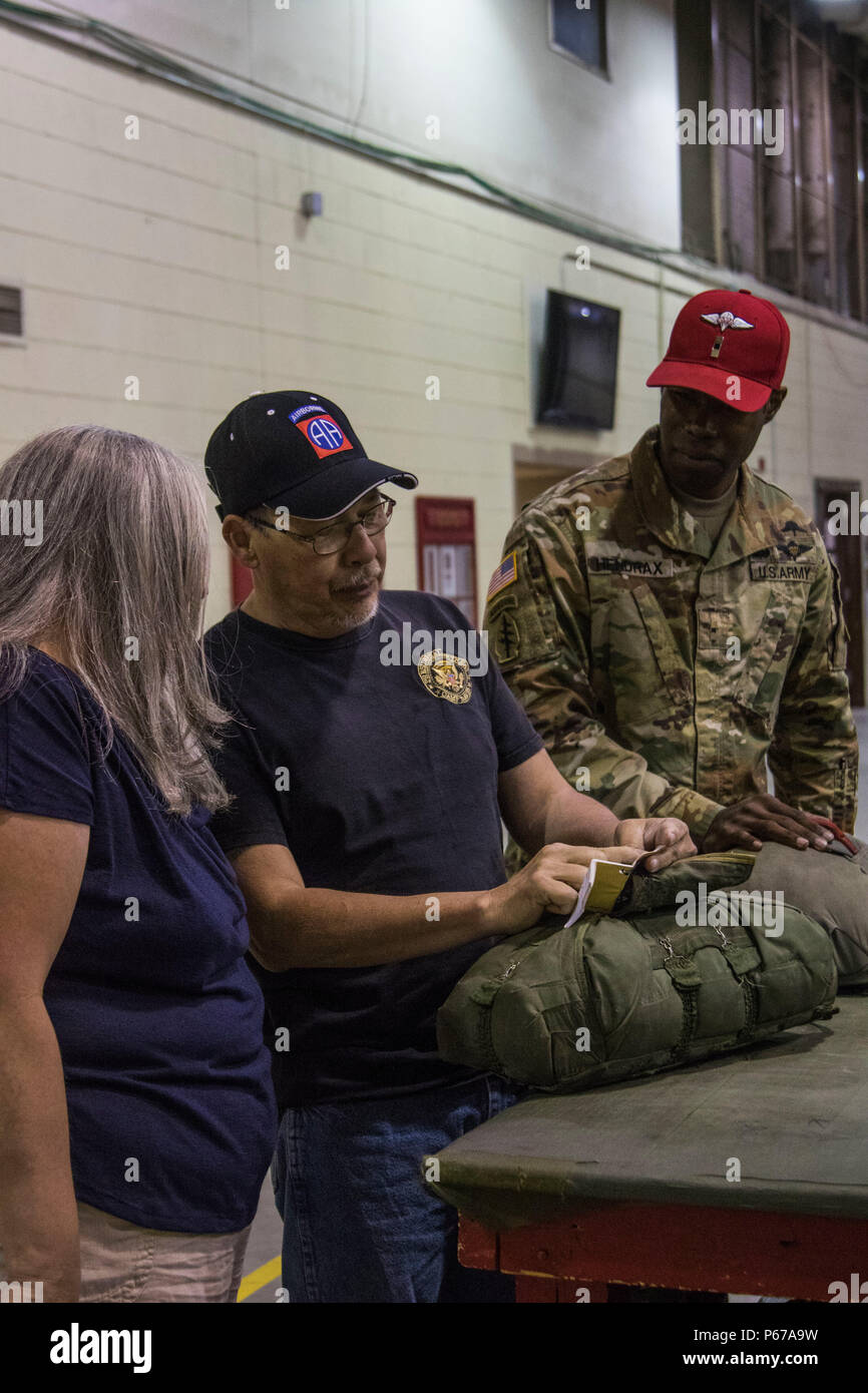 Derek Sharp, a veteran 82nd Airborne Division Paratrooper, talks to his ...