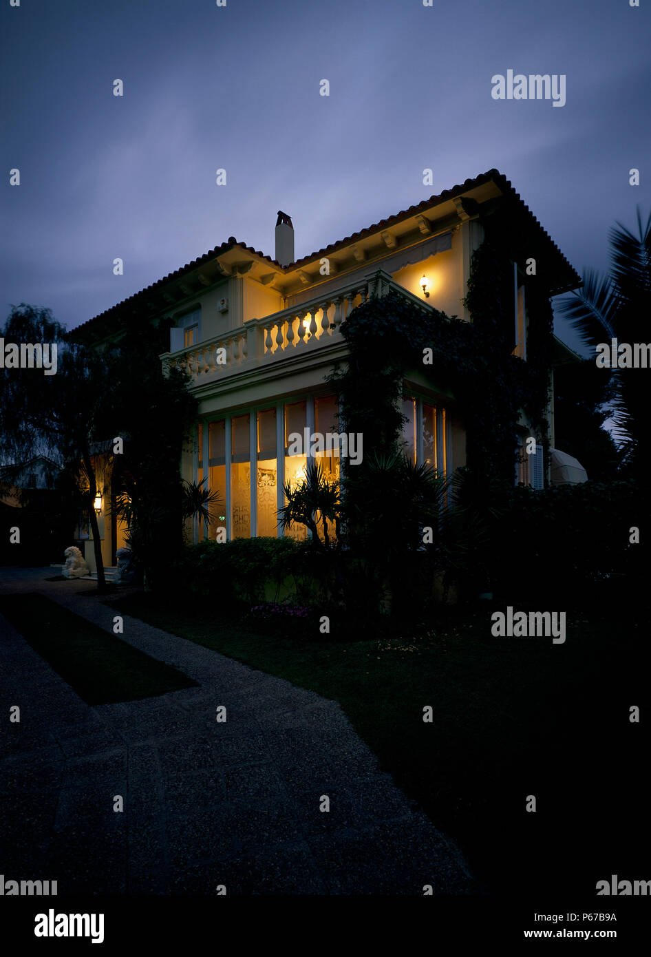 View of a lit house from below Stock Photo - Alamy