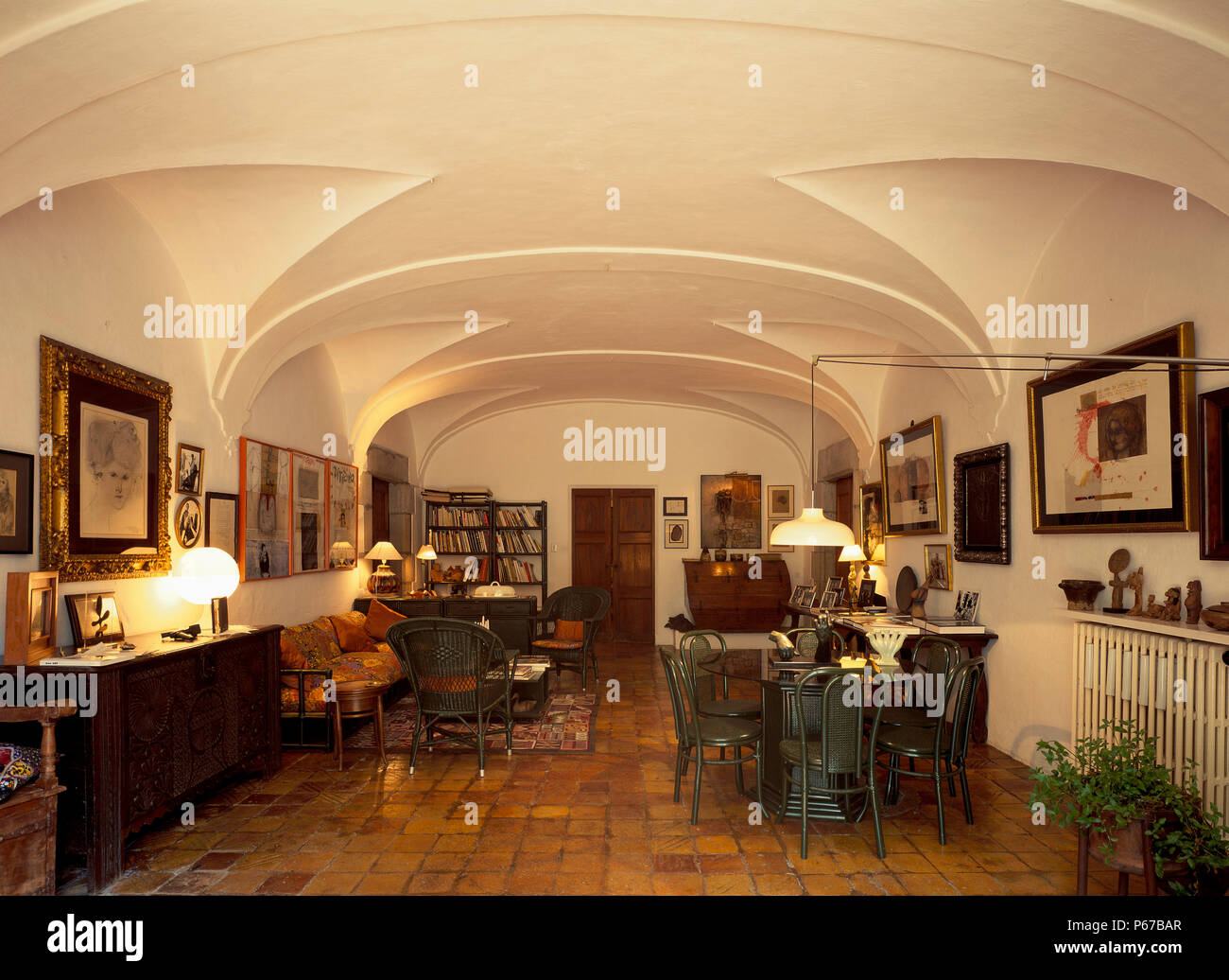 View of a living room adorned with paintings Stock Photo - Alamy