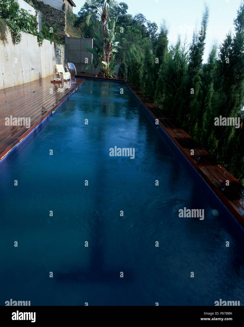 View of a long swimming pool Stock Photo - Alamy