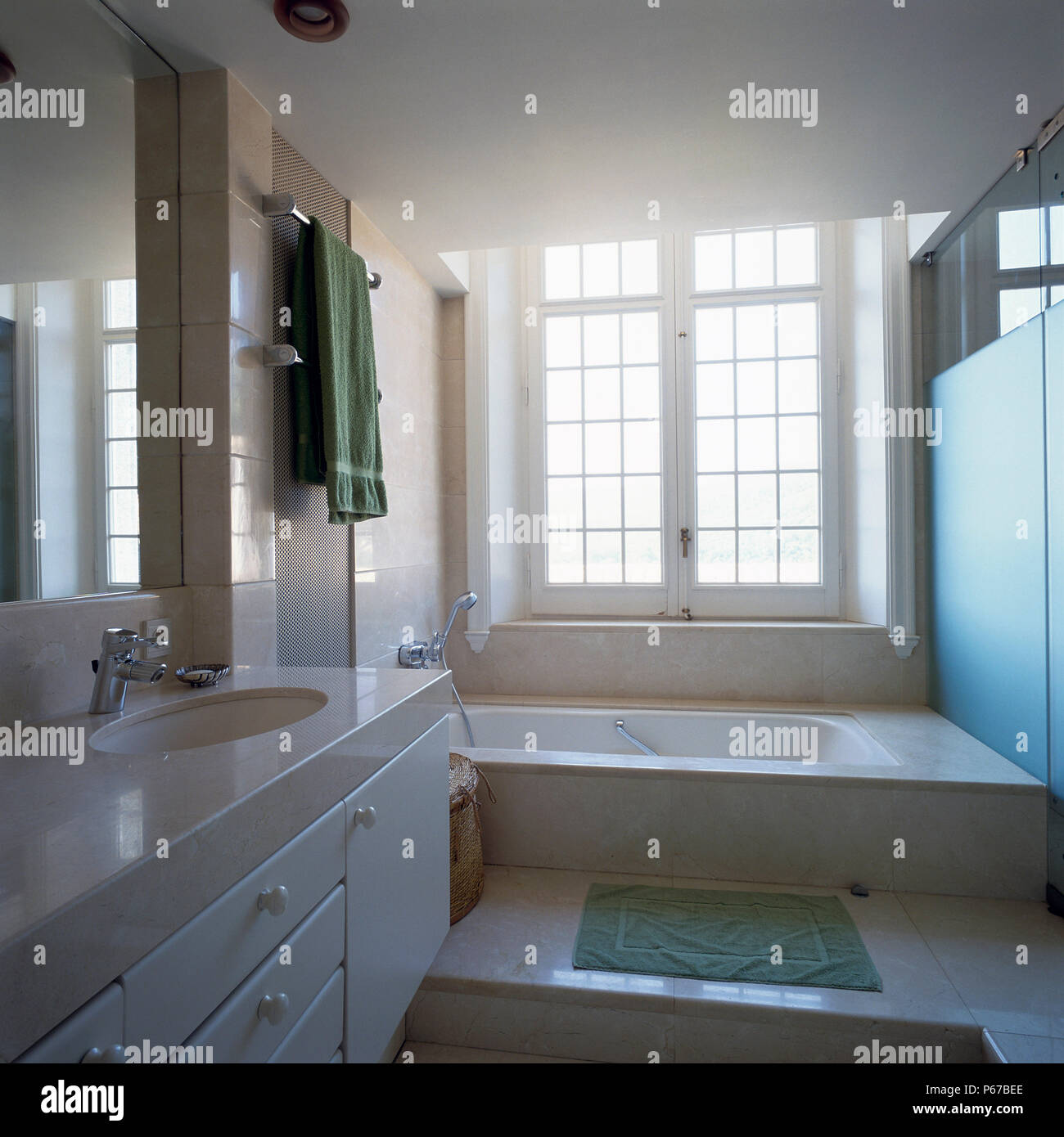 View of a neat and tidy bathroom Stock Photo - Alamy