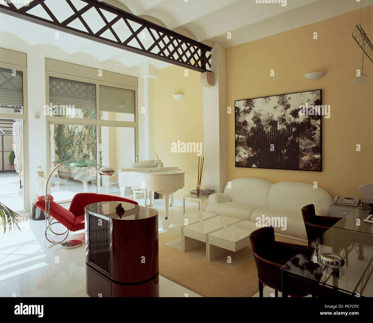 View of an eclectic living room Stock Photo - Alamy