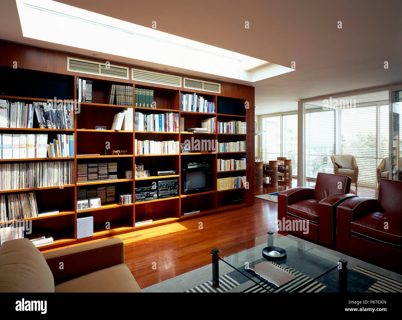 View of an elegant library in a home Stock Photo - Alamy
