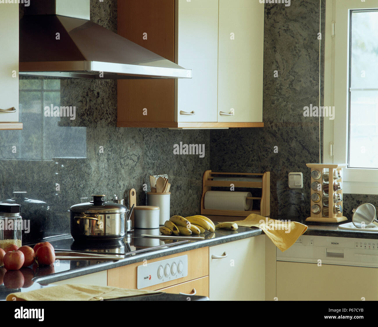 View of apples and bananas on a counter Stock Photo - Alamy