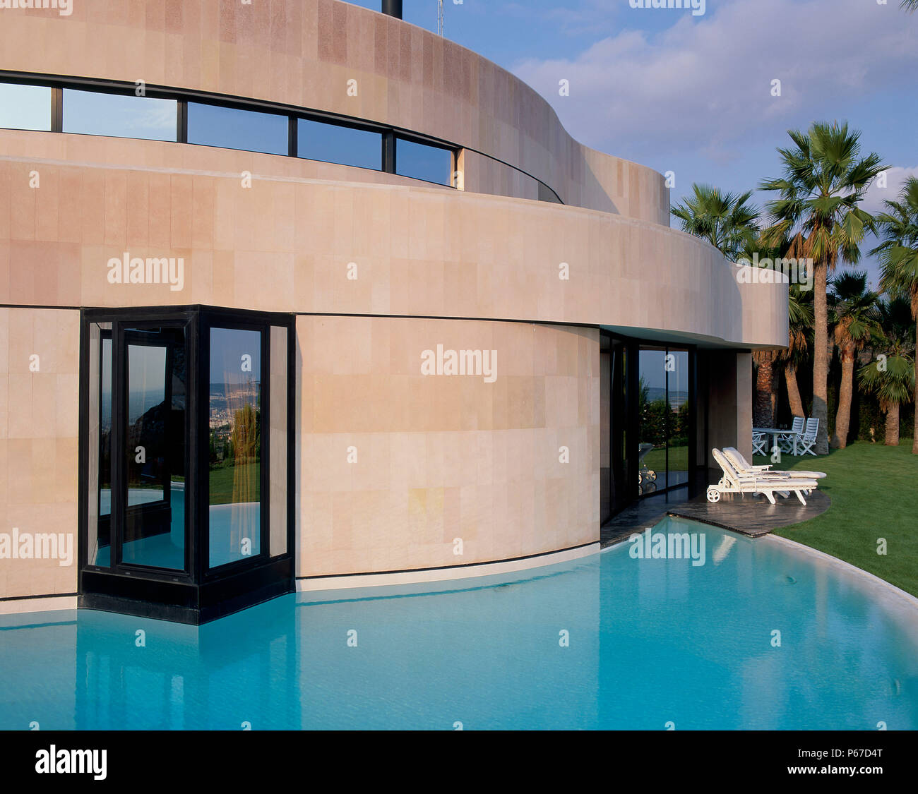 View of house with an adjoined swimming pool Stock Photo - Alamy