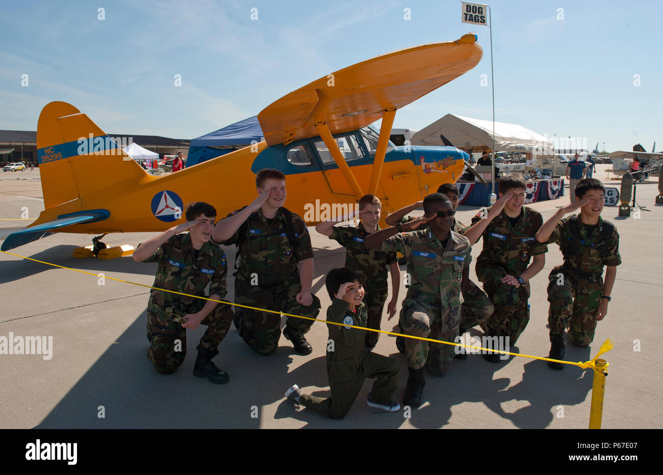 Members of the New Jersey Civil Air Patrol pose with a new friend at ...