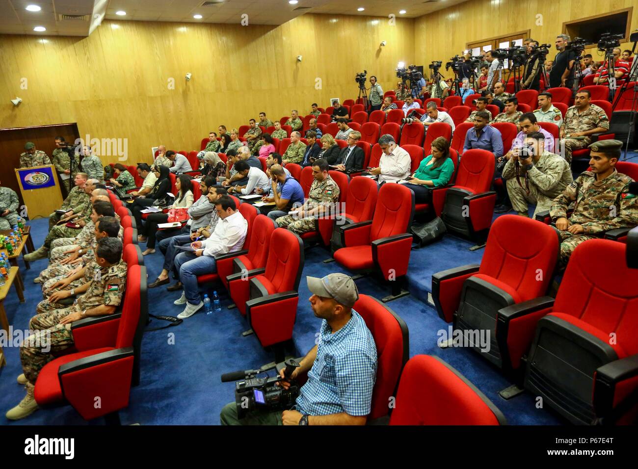 Journalists from international and Jordanian news organizations attend ...