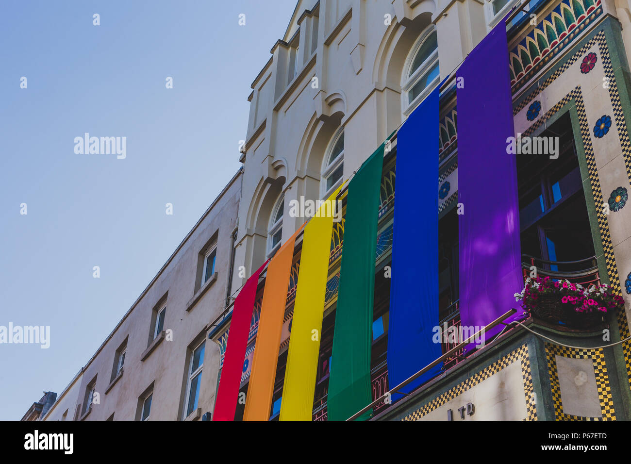 DUBLIN, IRELAND - June 27th, 2018: rainbow flags off a building in ...