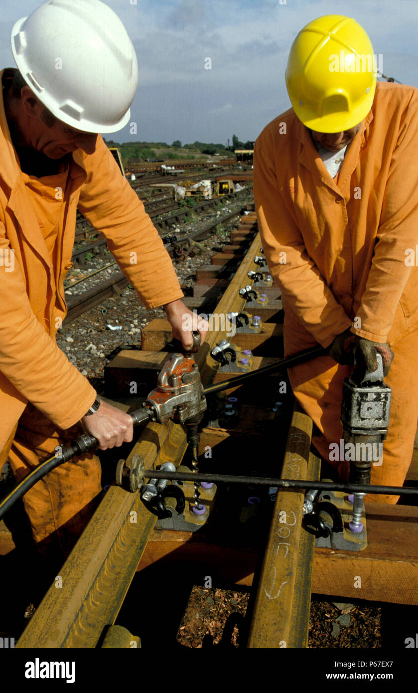 Assembly of new rail sections. 1994 Stock Photo - Alamy