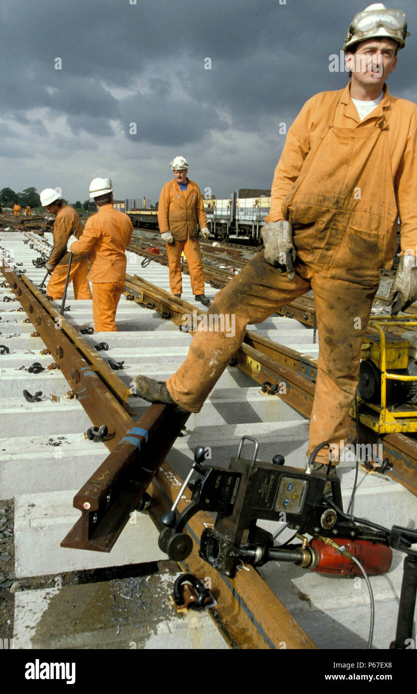 Assembly of new rail sections. 1994 Stock Photo - Alamy