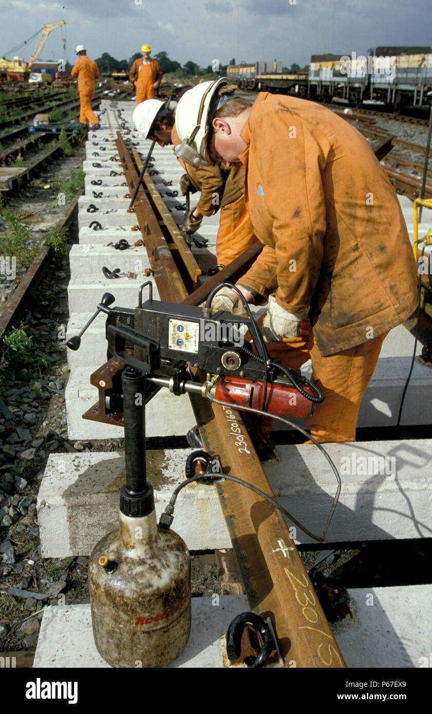 Assembly of new rail sections. C1994 Stock Photo - Alamy