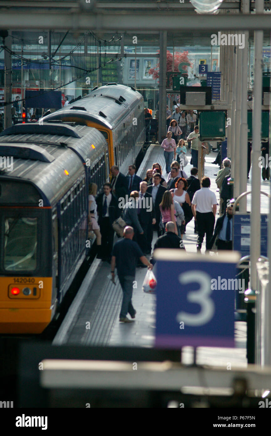 Busy scene at Manchester Piccadilly as passengers leave their train ...