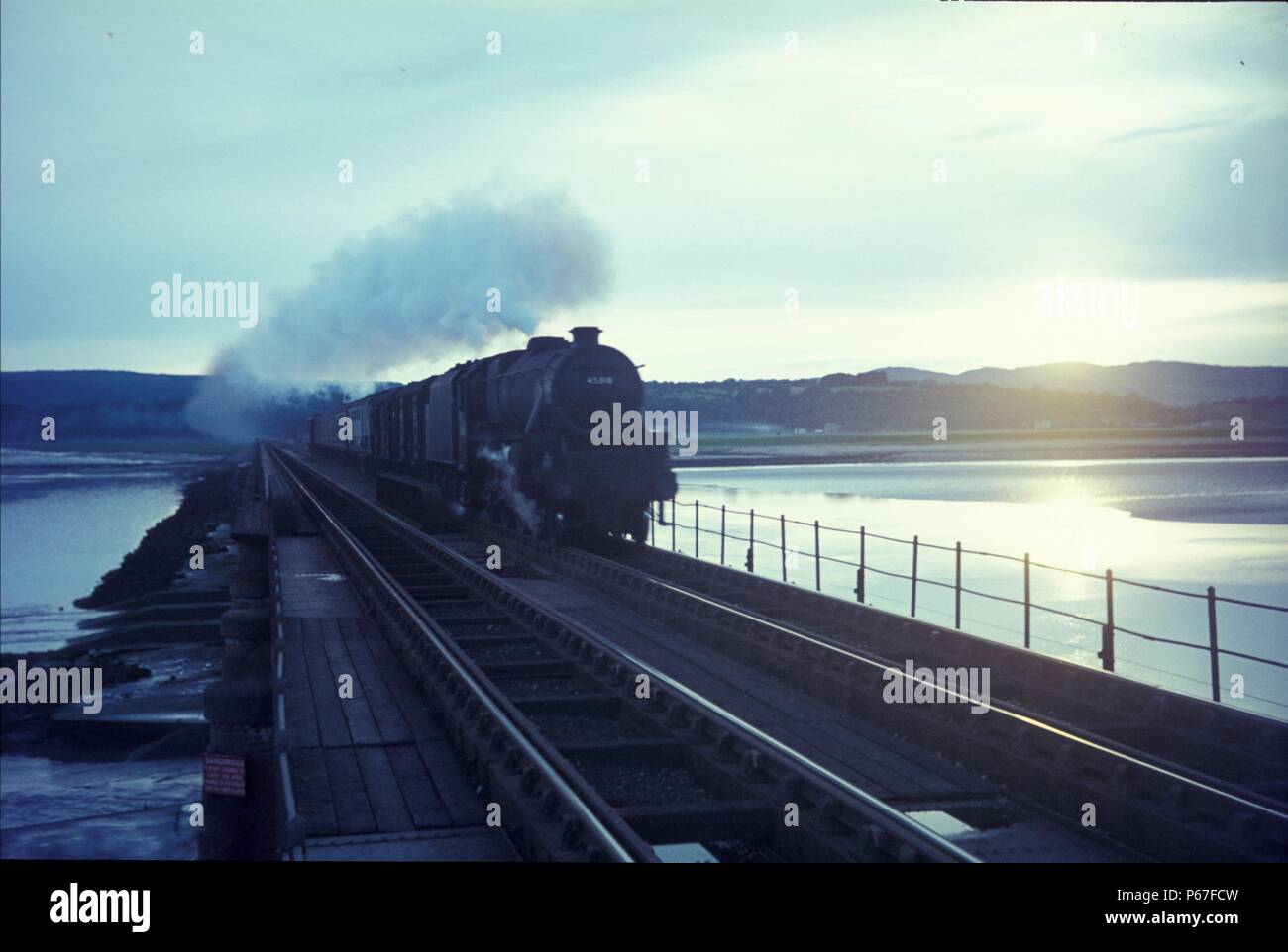 Freight train crossing viaduct hi-res stock photography and images - Alamy