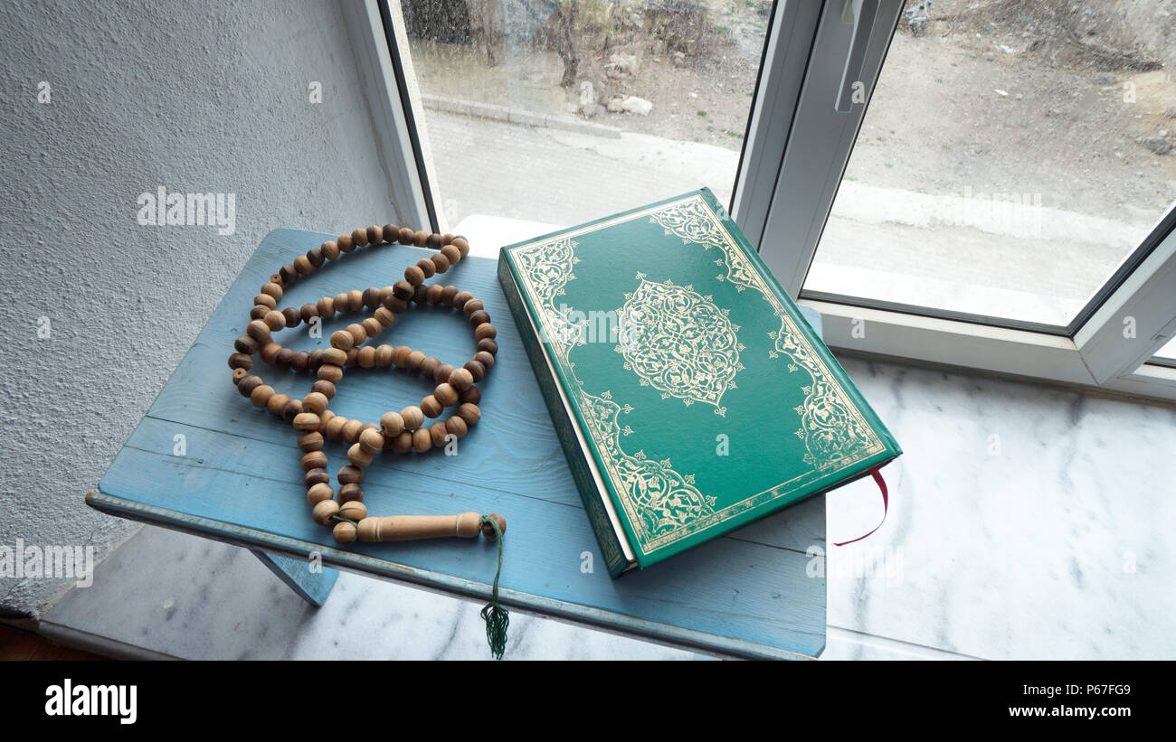 custom printed Holy Quran and kuka tree handmade beads Stock Photo - Alamy