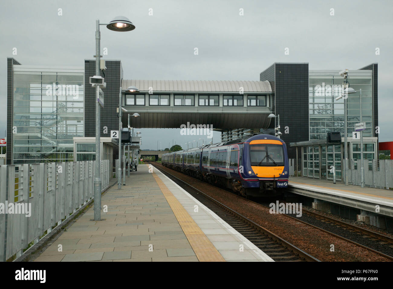 Edinburgh Park station with a First Scotrail Class 170 Turbostar at the ...