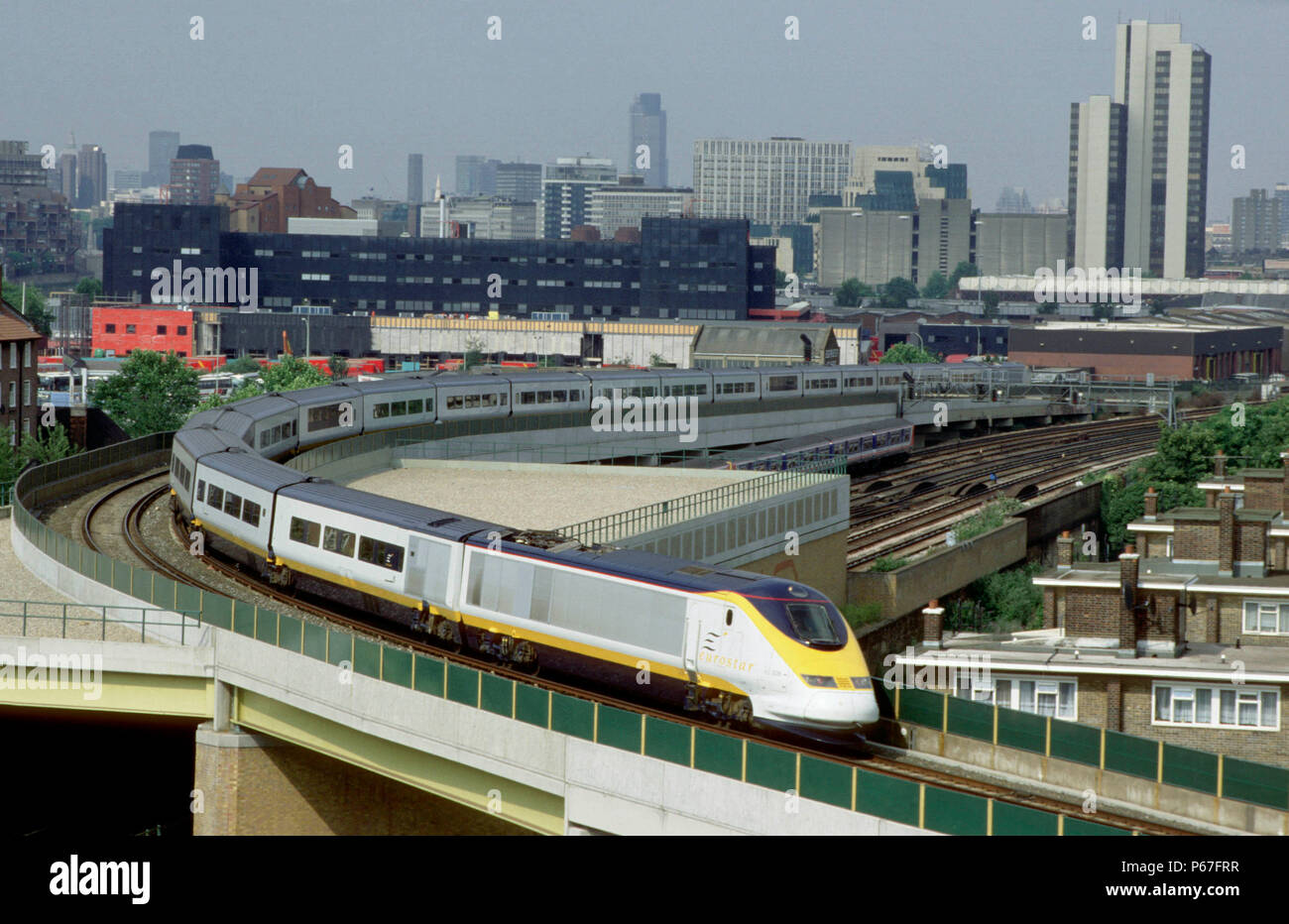 Eurostar departing with London skyline in the background. C1995 Stock ...