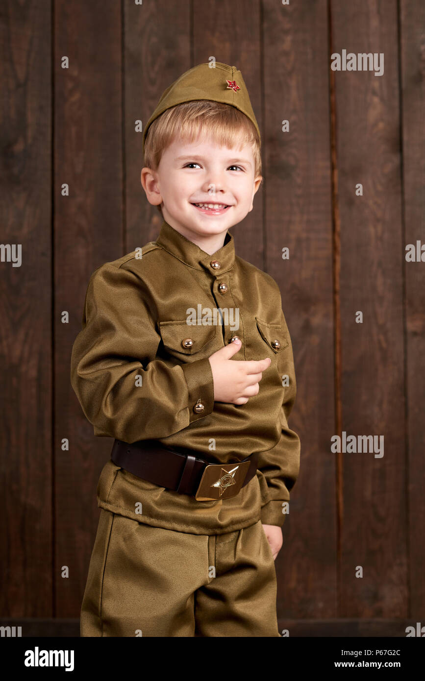 children are dressed as soldier in retro military uniforms Stock Photo ...