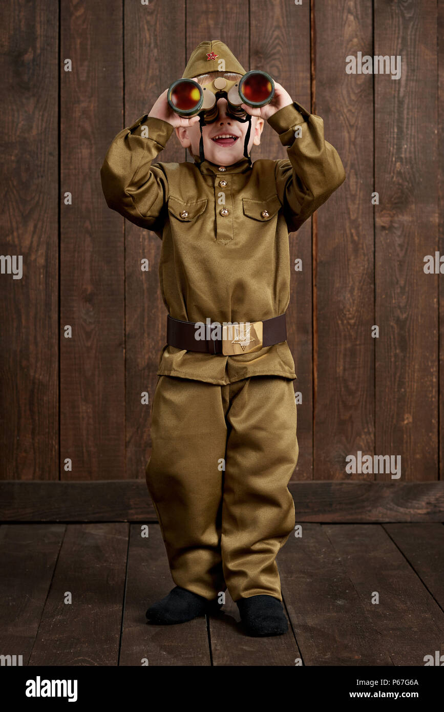 children are dressed as soldier in retro military uniforms Stock Photo ...