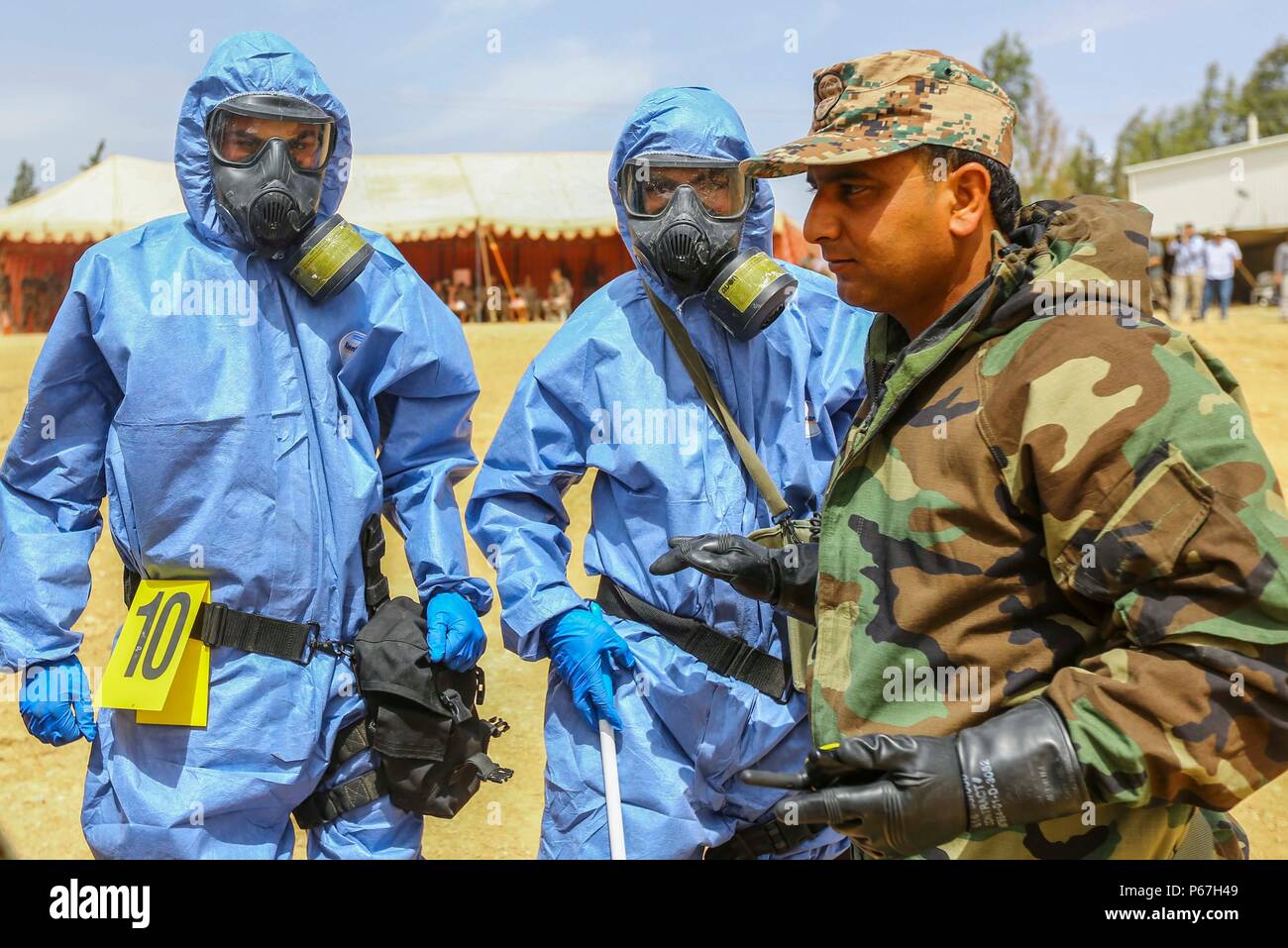 Members of the Jordanian Armed forces participate in a Chemical ...