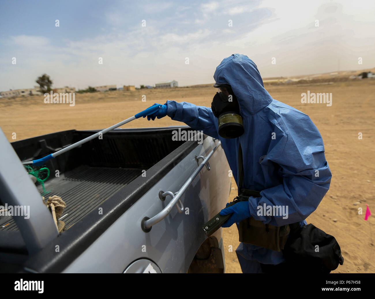 Members of the Jordanian Armed forces participate in a Chemical ...