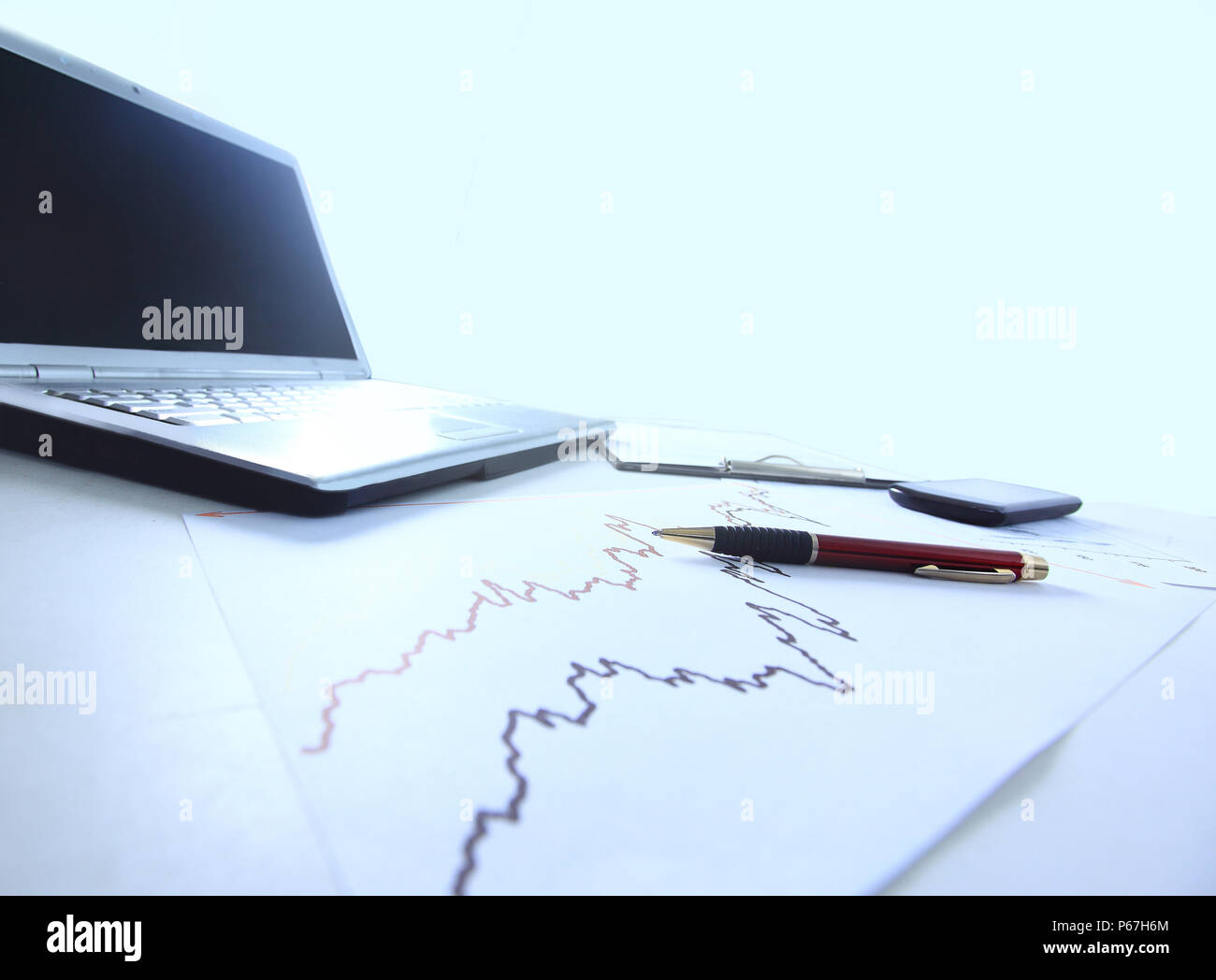 business background.a laptop computer and financial graph on th Stock ...