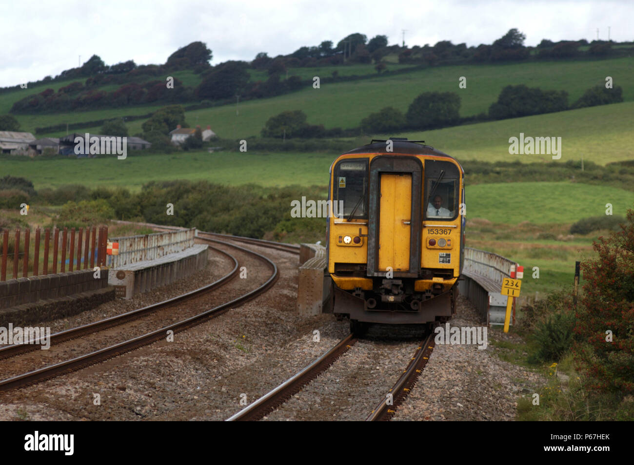 The Great Western Railway 2004. Kidwelly. Class 153 unit approaches up ...