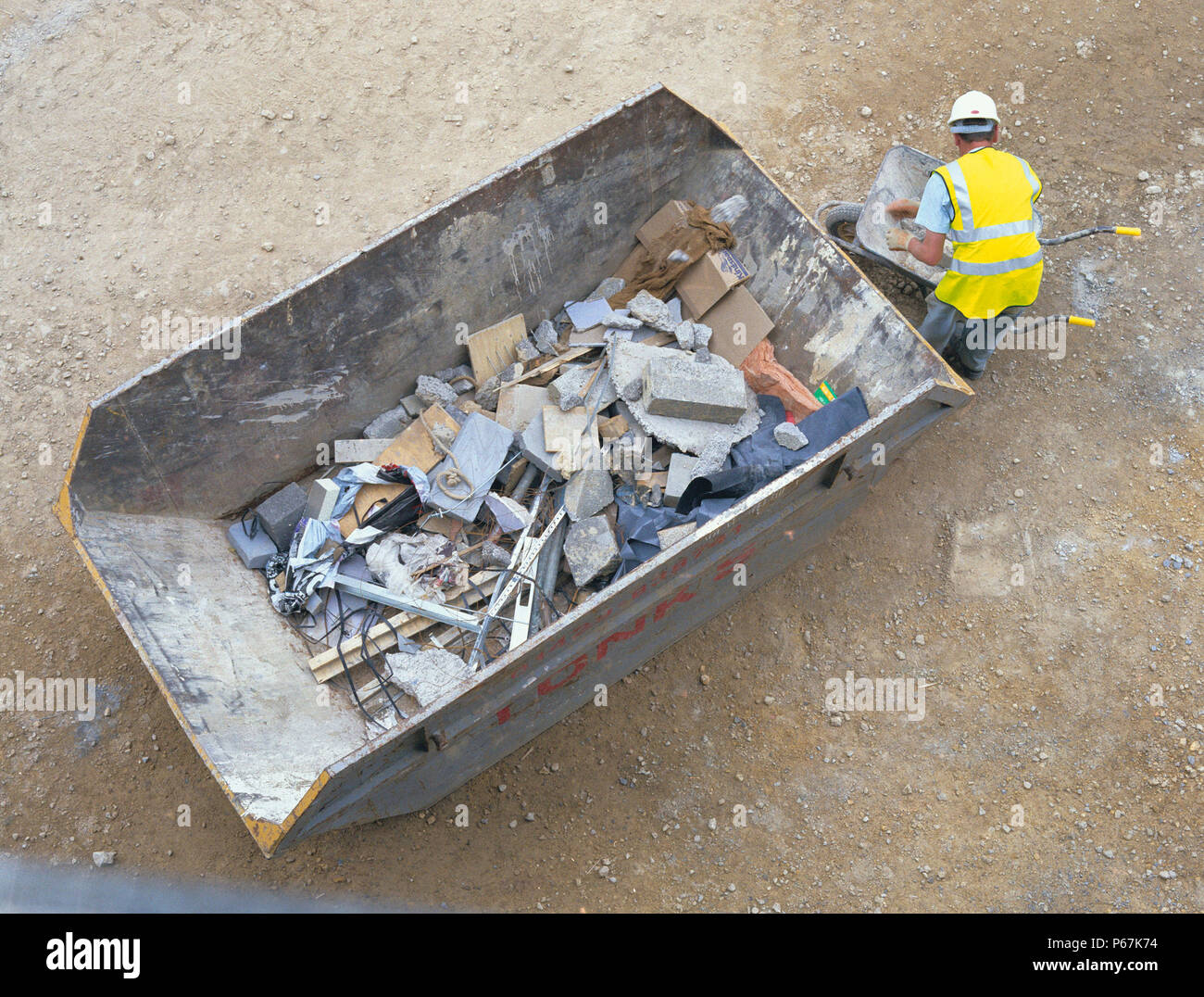 Worker collecting scrap metal hi-res stock photography and images - Alamy