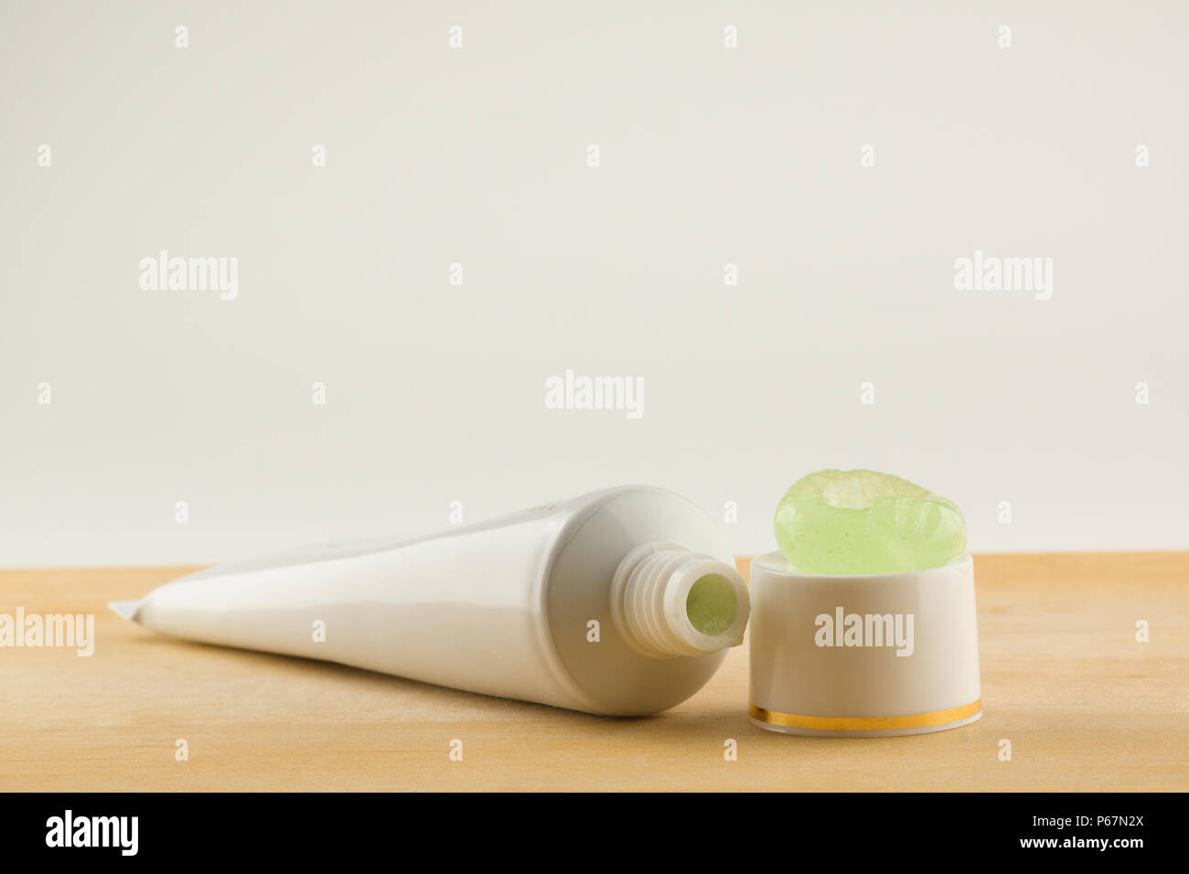 white medical cream in a close-up container Stock Photo - Alamy