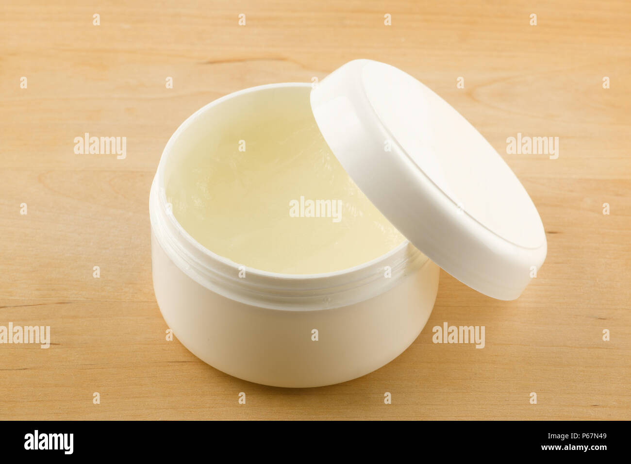 white medical cream in a close-up container Stock Photo - Alamy
