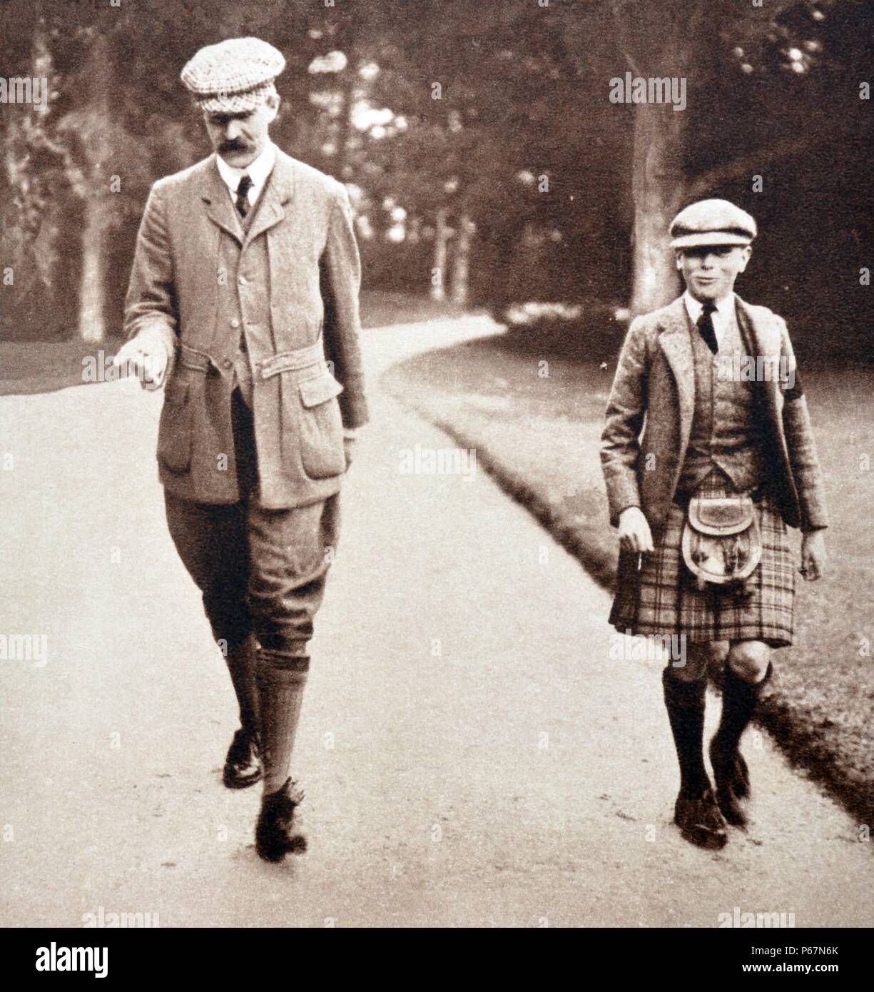 Edward VIII (aged 14) wearing a kilt, walking with his tutor, Mr ...