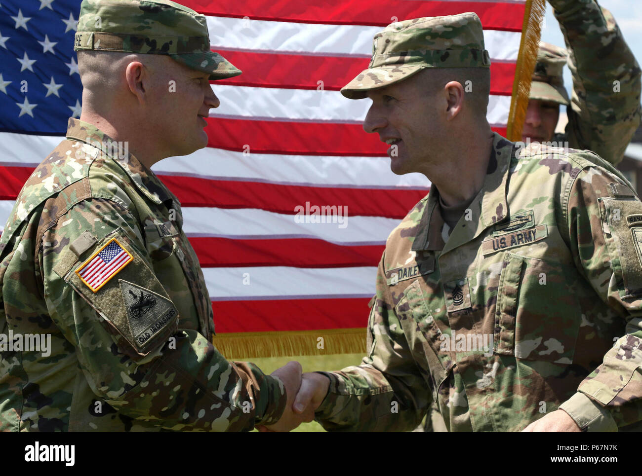 The Sergeant Major of the Army Daniel A. Dailey congratulates Sgt ...