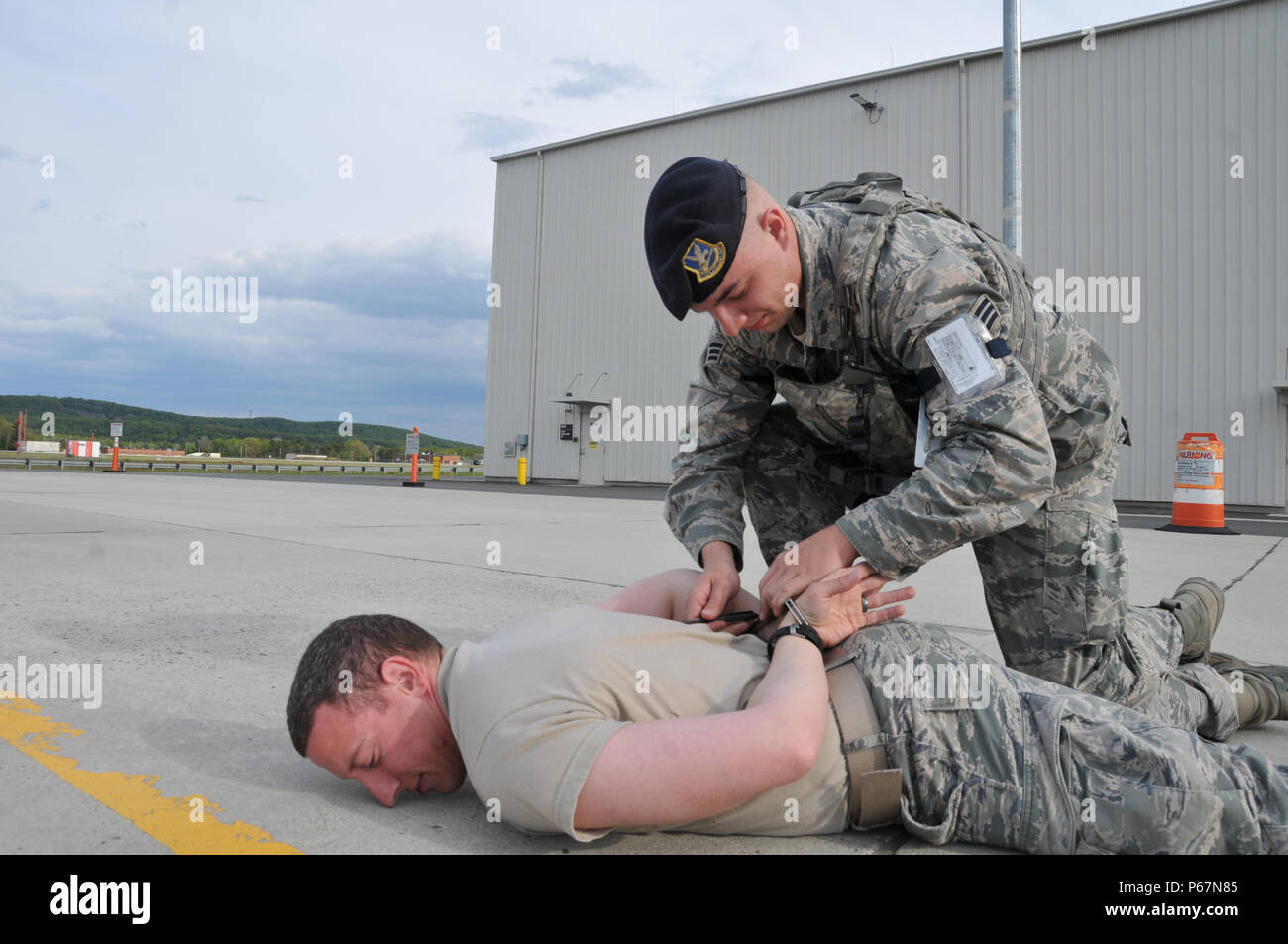 Senior Airman Nicholas Asselin of the 104th Fighter Wing Security Force ...