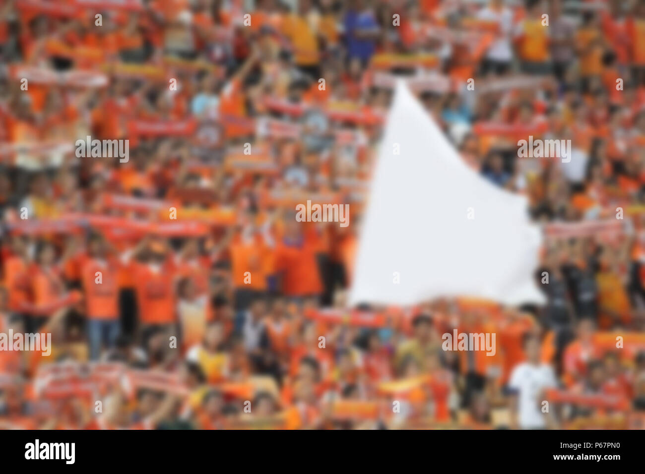 blurry of Soccer fans in a match and Spectators at football stadium ...