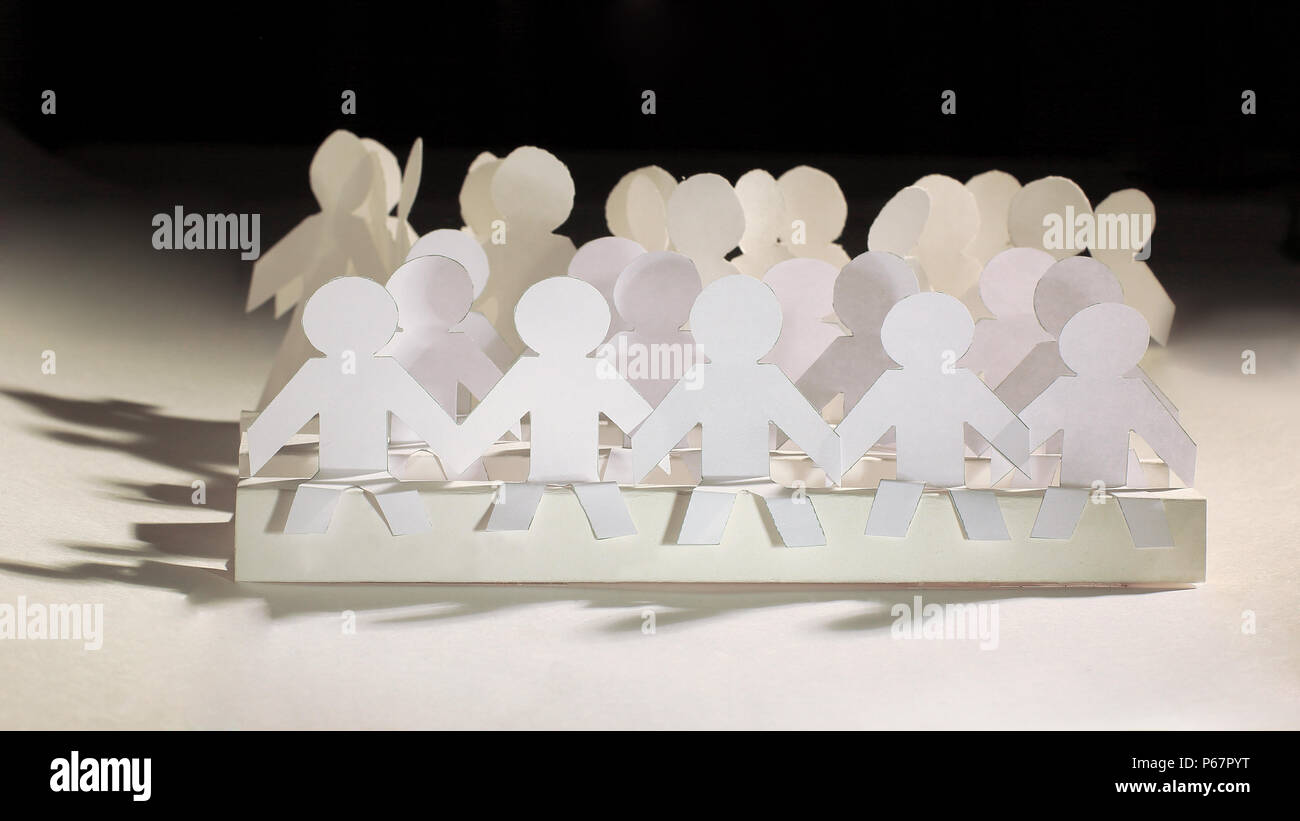 business concept.a large team of paper doll Stock Photo - Alamy