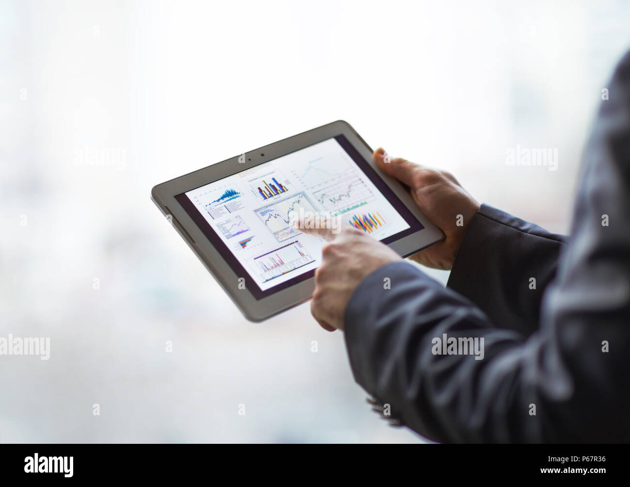 Hands of people working with tablet computer Stock Photo - Alamy