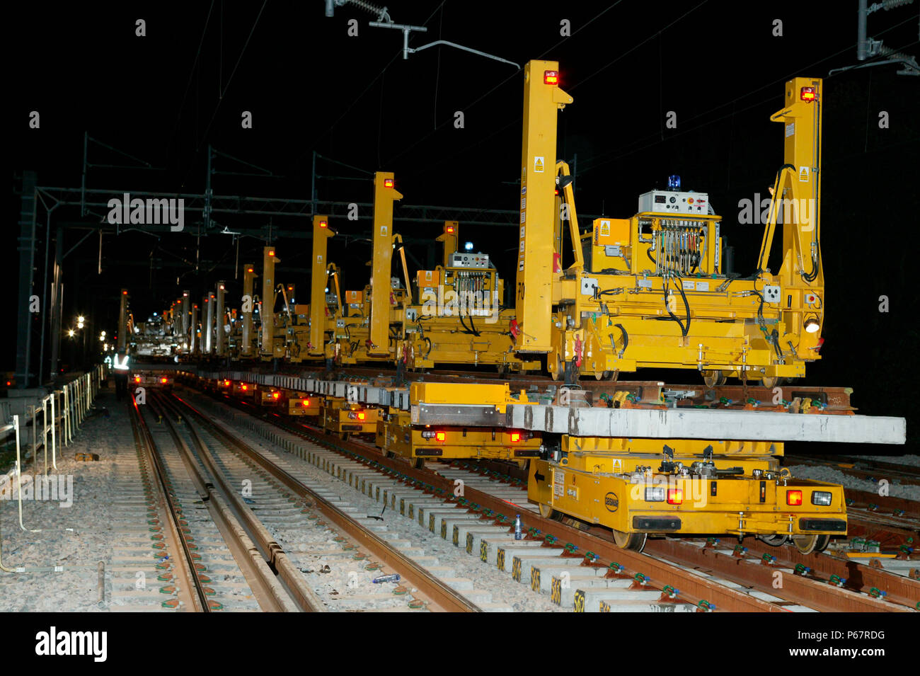 New track panels en route to their assembly site on the new alignment ...