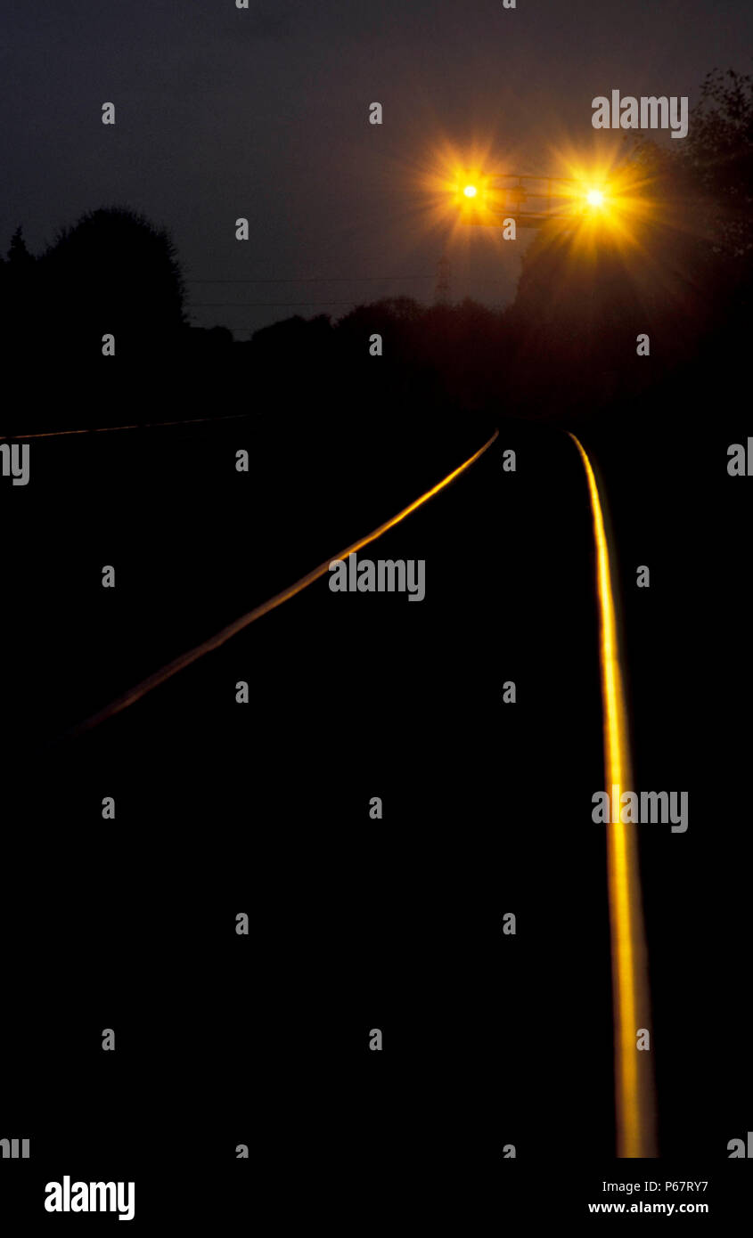 Orange signals on a section of UK railway Stock Photo - Alamy